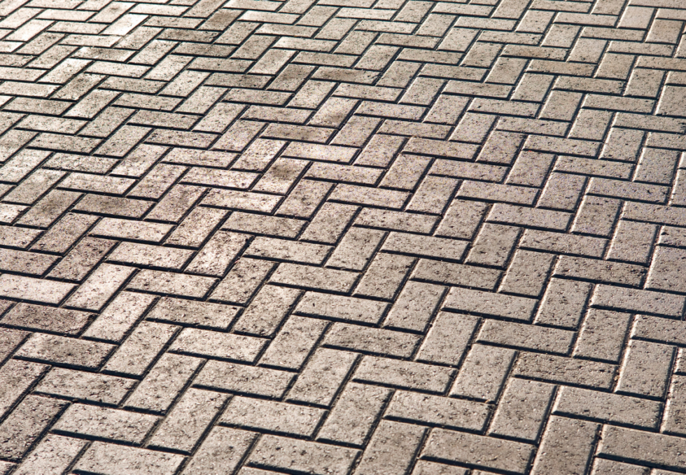 How To Fix A Sloping Interlocking Walkway? - Green Machine